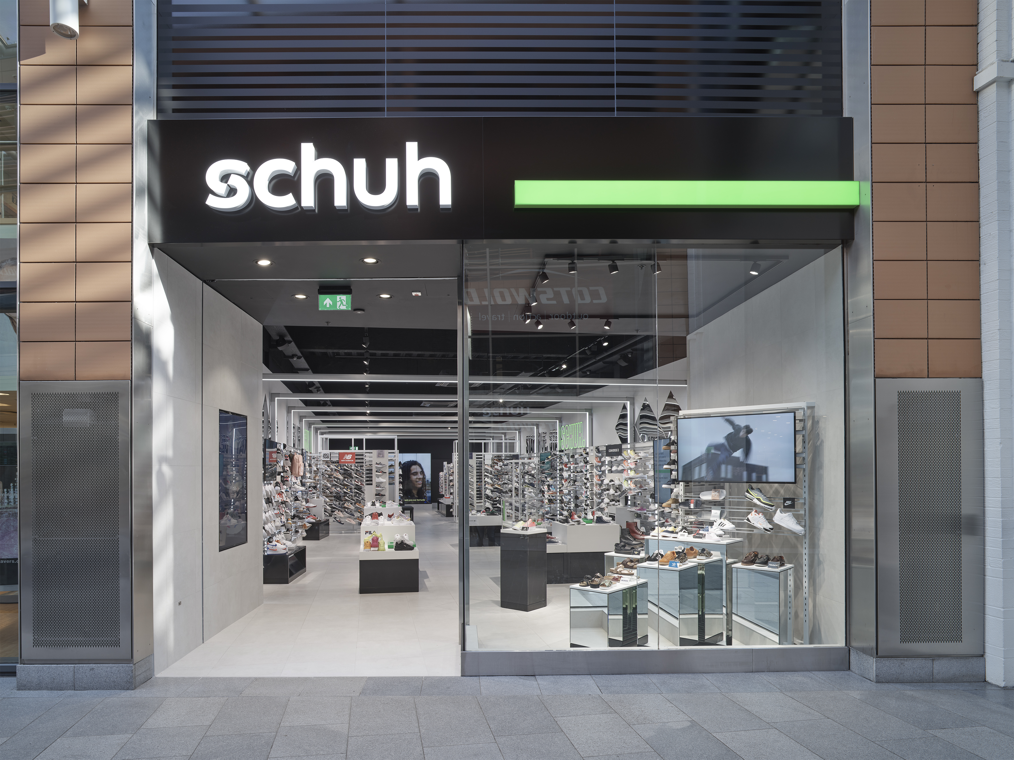Schuh swings to a loss
