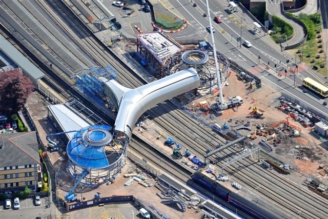 Grimshaw’s ETFE rail bridge steams ahead