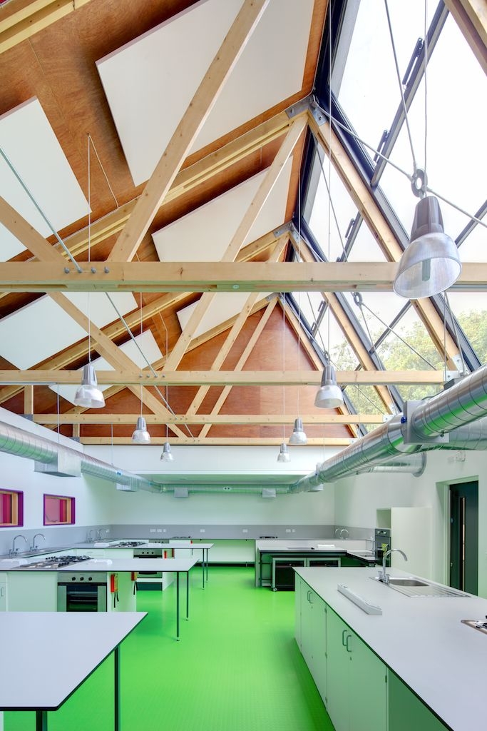 Studio Three shows off black brick and magenta food hub