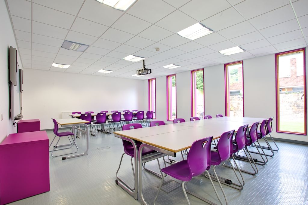 Studio Three shows off black brick and magenta food hub