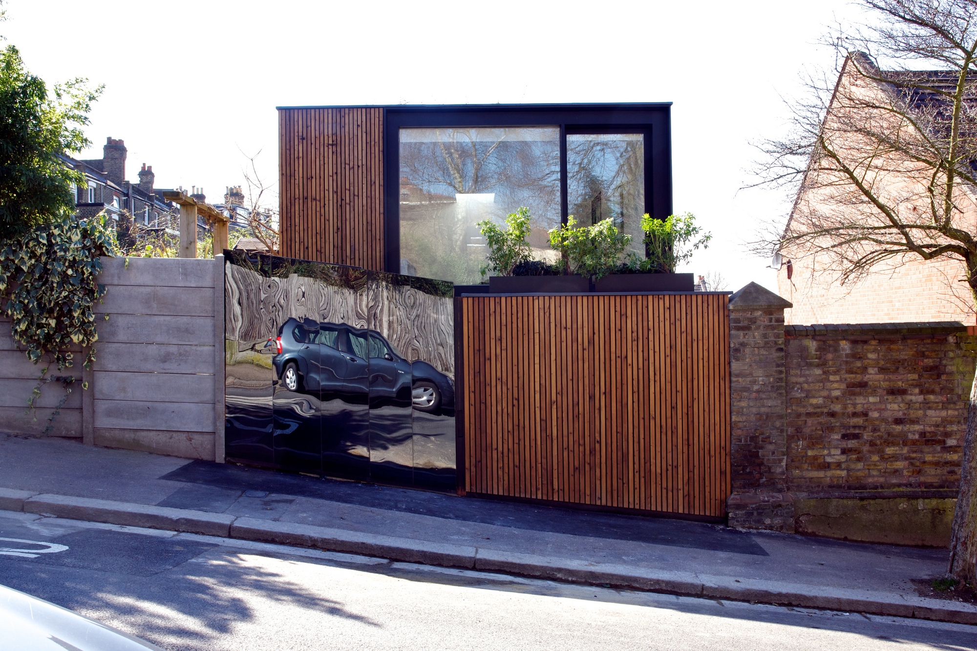 AAVA builds compact two-bed courtyard house for £165k