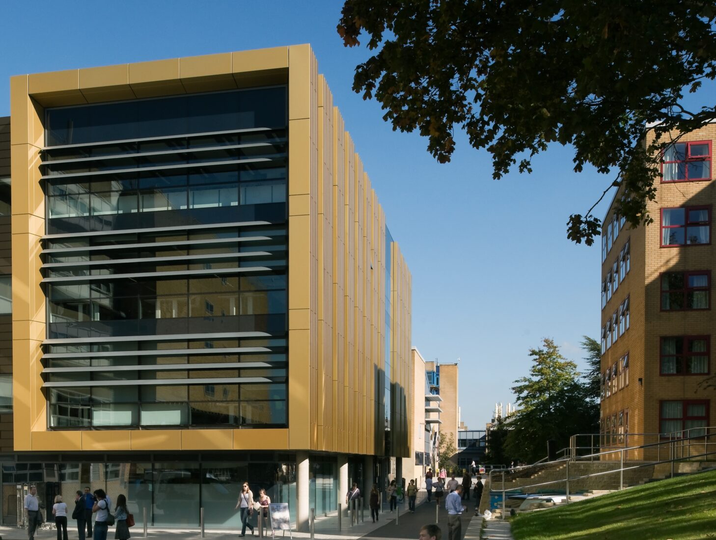 RMJM's 'gold and bronze' learning centre opens at Surrey University