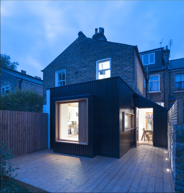 Oliver Bayliss unveils black timber extension