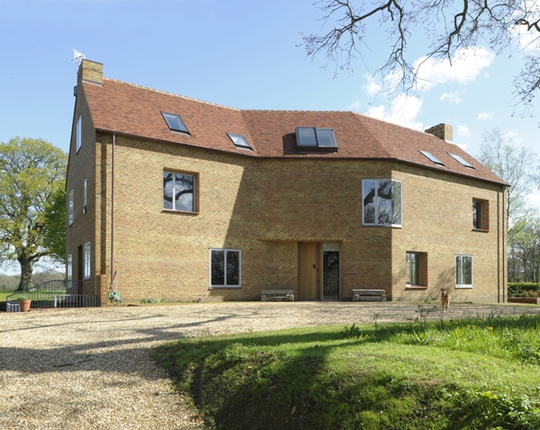 ZMMA creates twisted brick farmhouse for developer Crispin Kelly