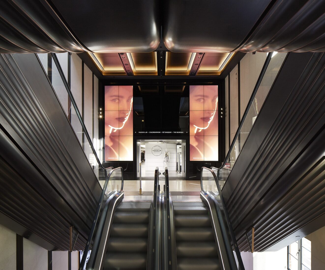 Make reveals bronze-clad Harrods escalators