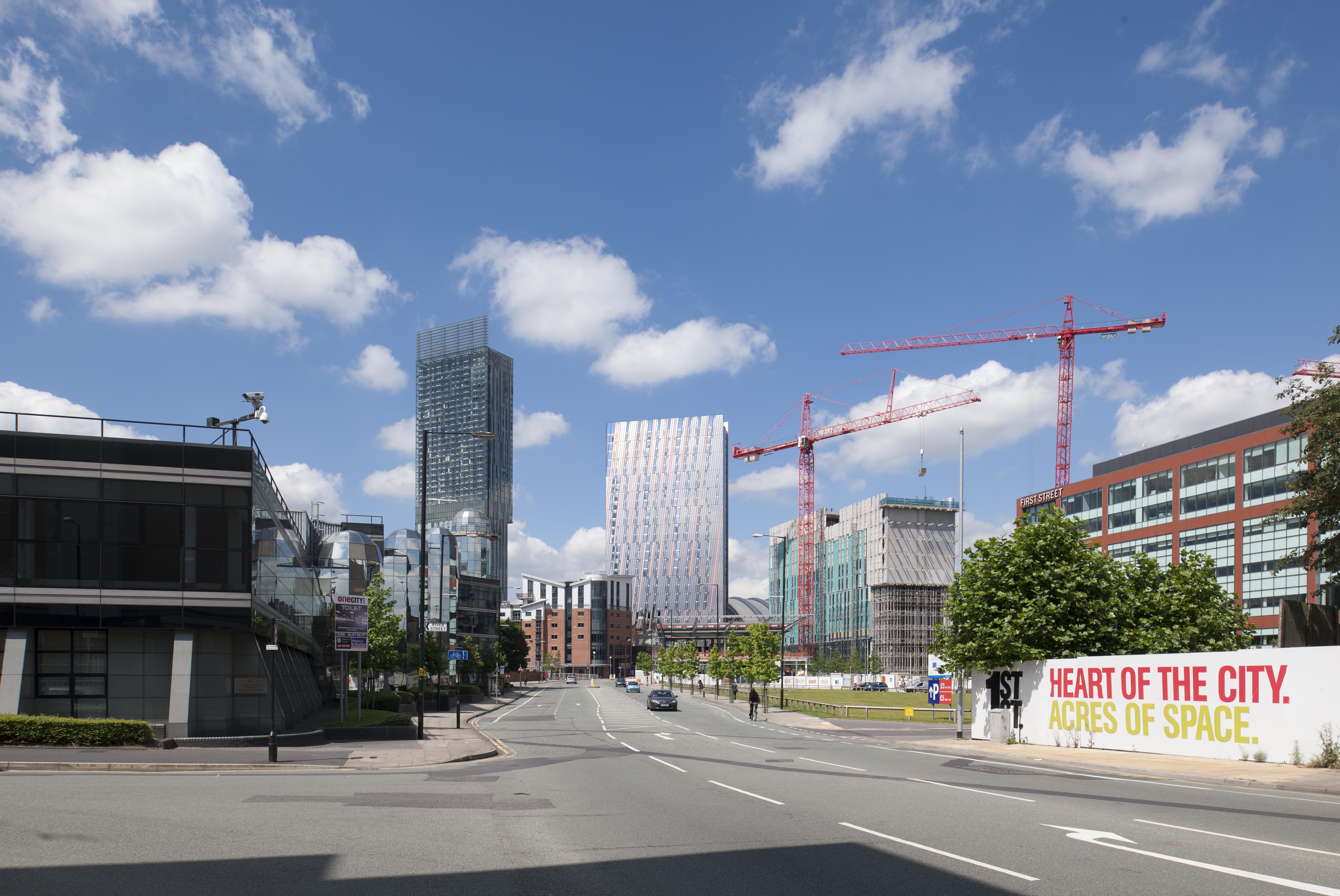 Manchester's Axis office tower re-emerges as homes