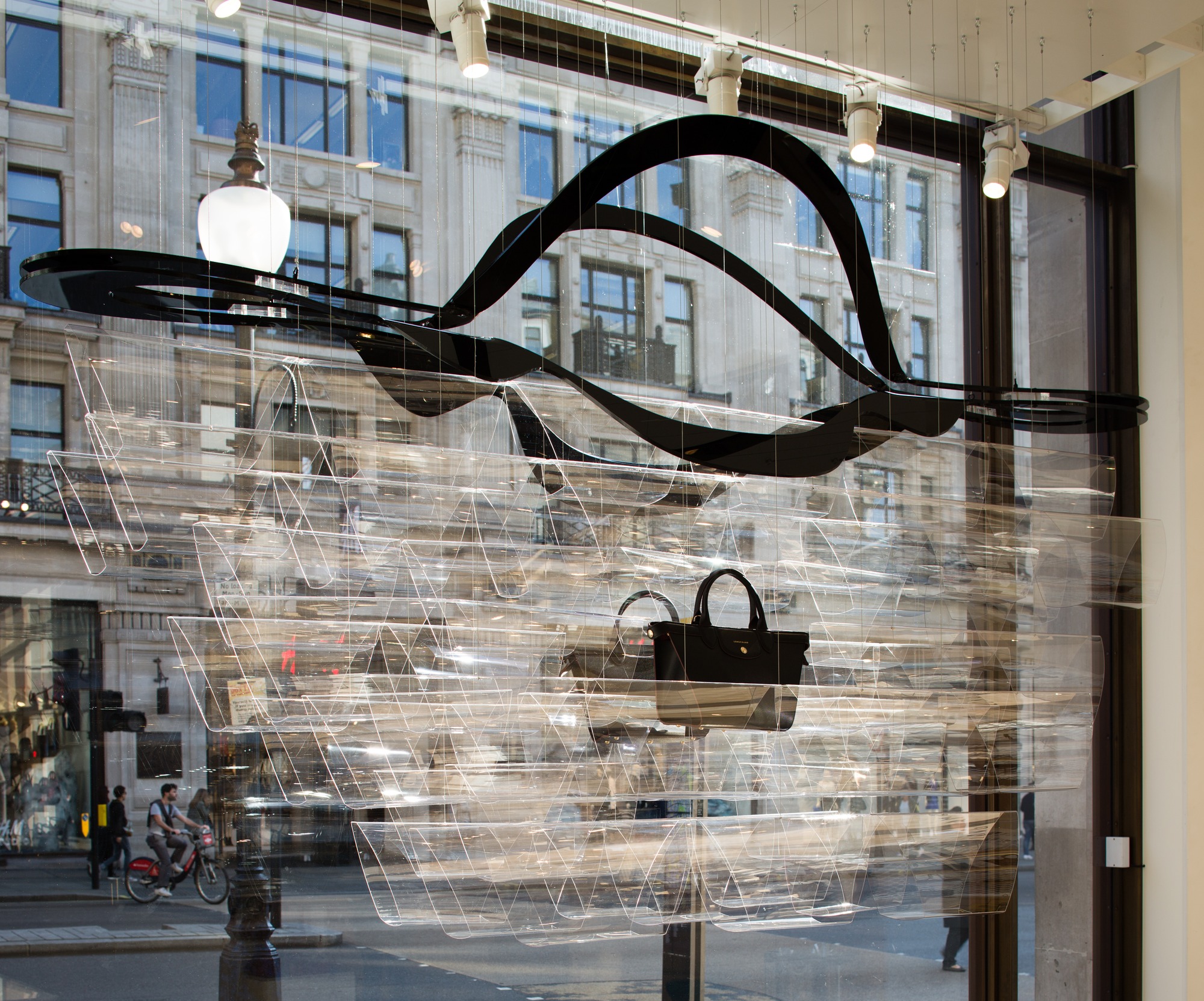 Wraps taken off architects' Regent Street shop window designs