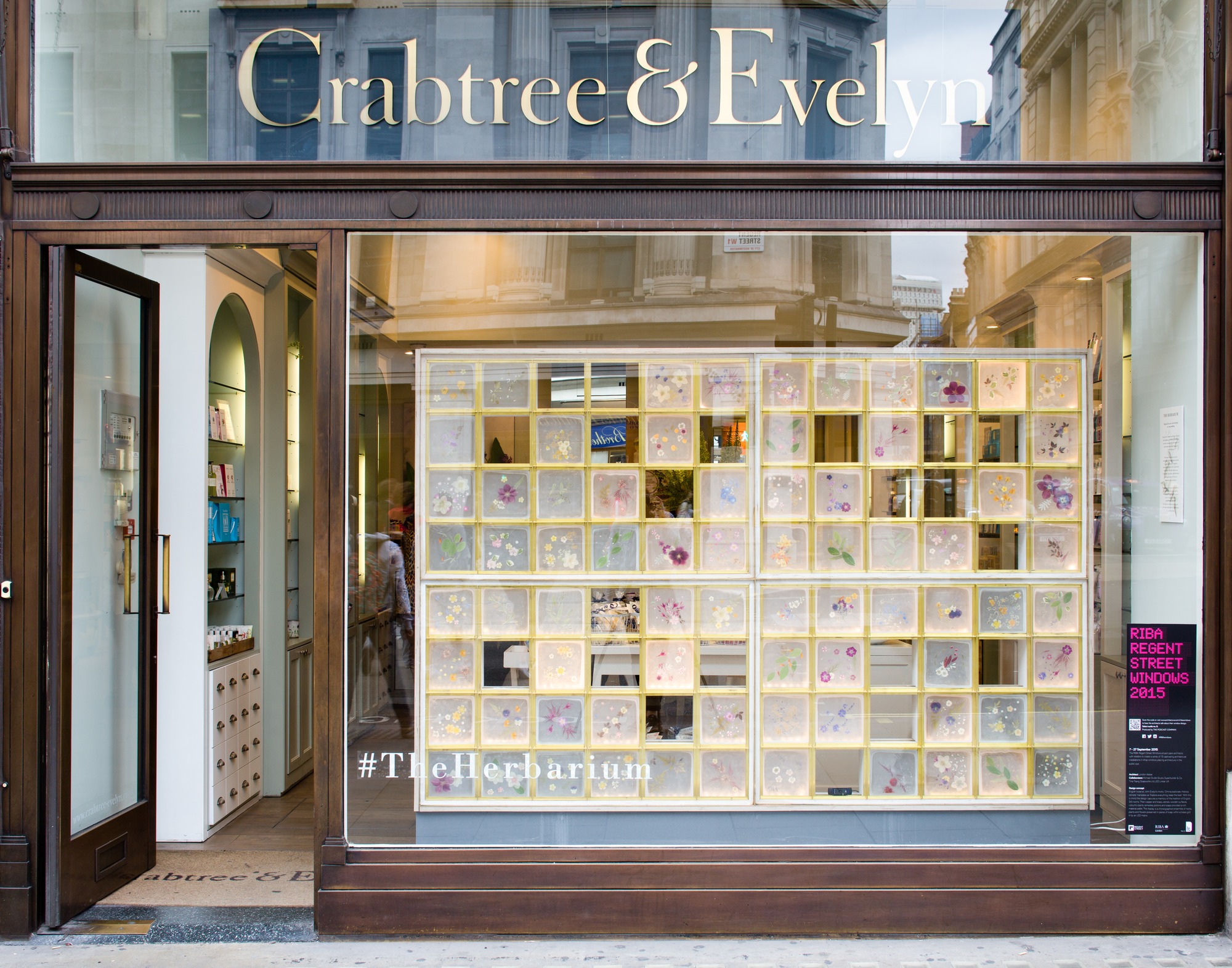 Wraps taken off architects' Regent Street shop window designs
