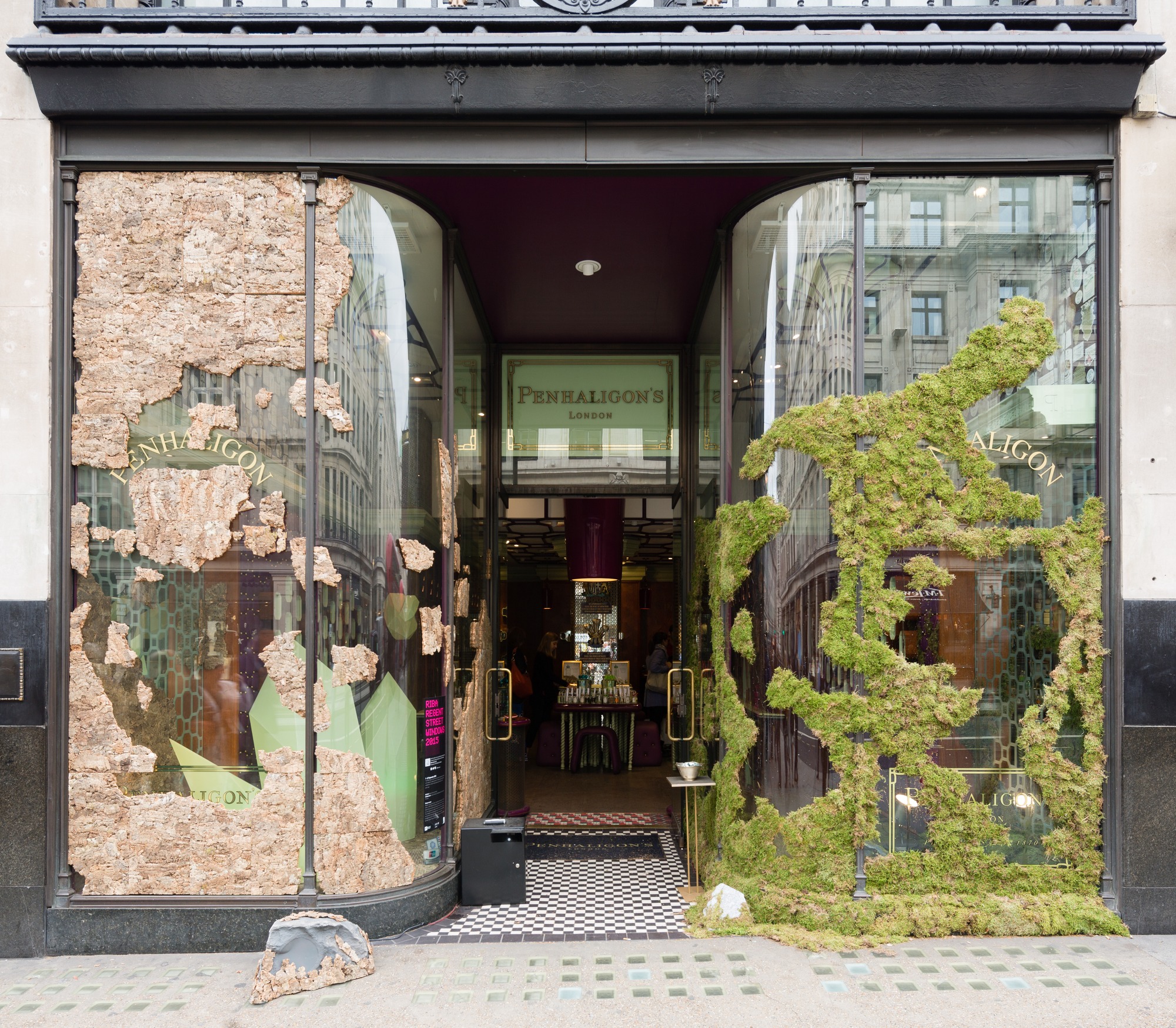 Wraps taken off architects' Regent Street shop window designs