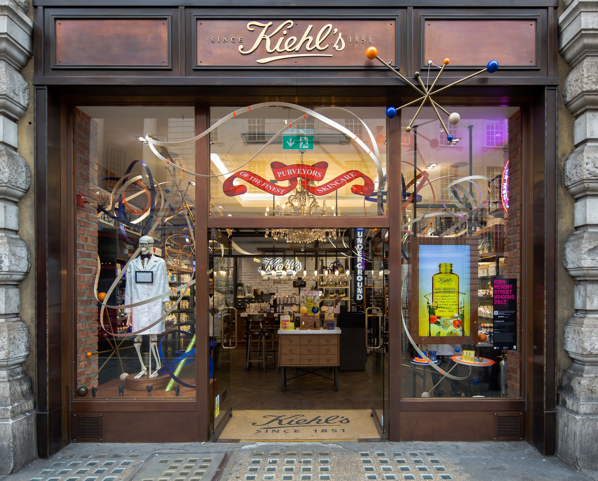 Wraps taken off architects' Regent Street shop window designs