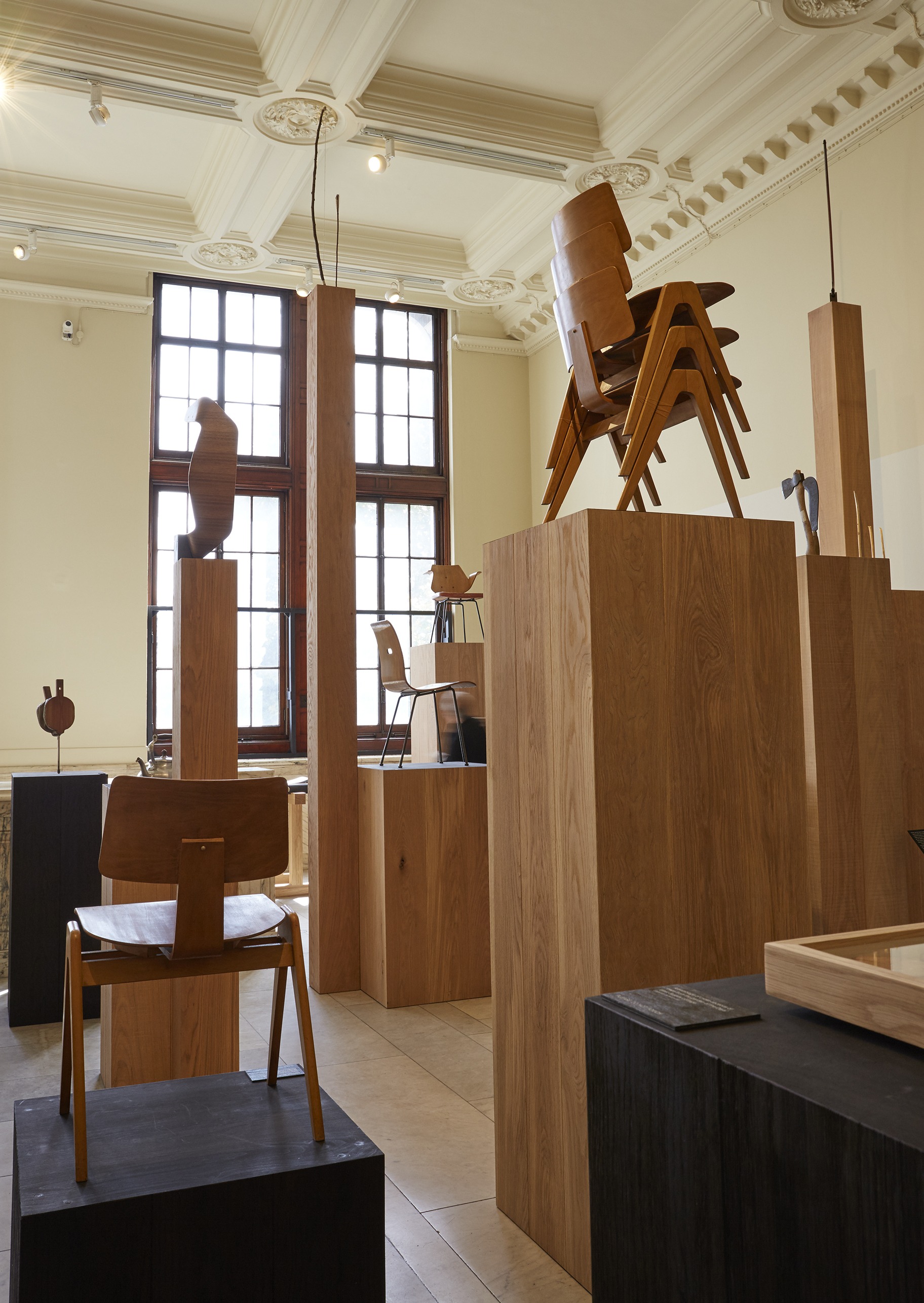 Assemble reveals timber ‘forest’ celebrating Robin Day’s work