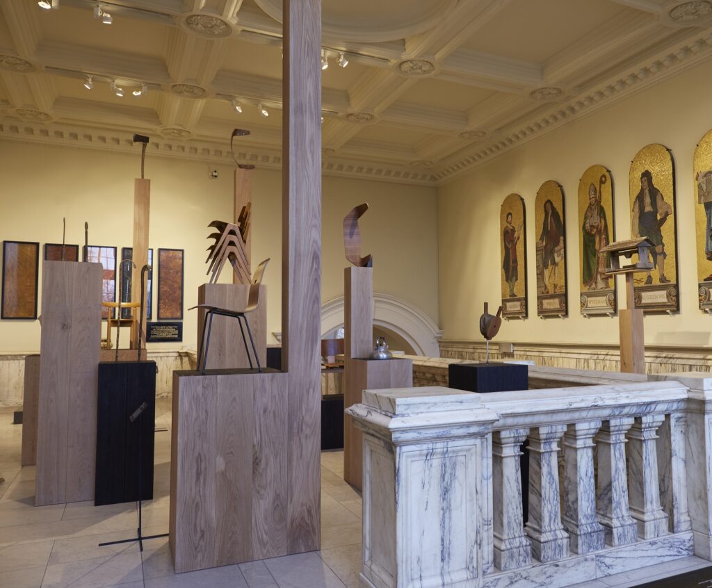 Assemble reveals timber ‘forest’ celebrating Robin Day’s work