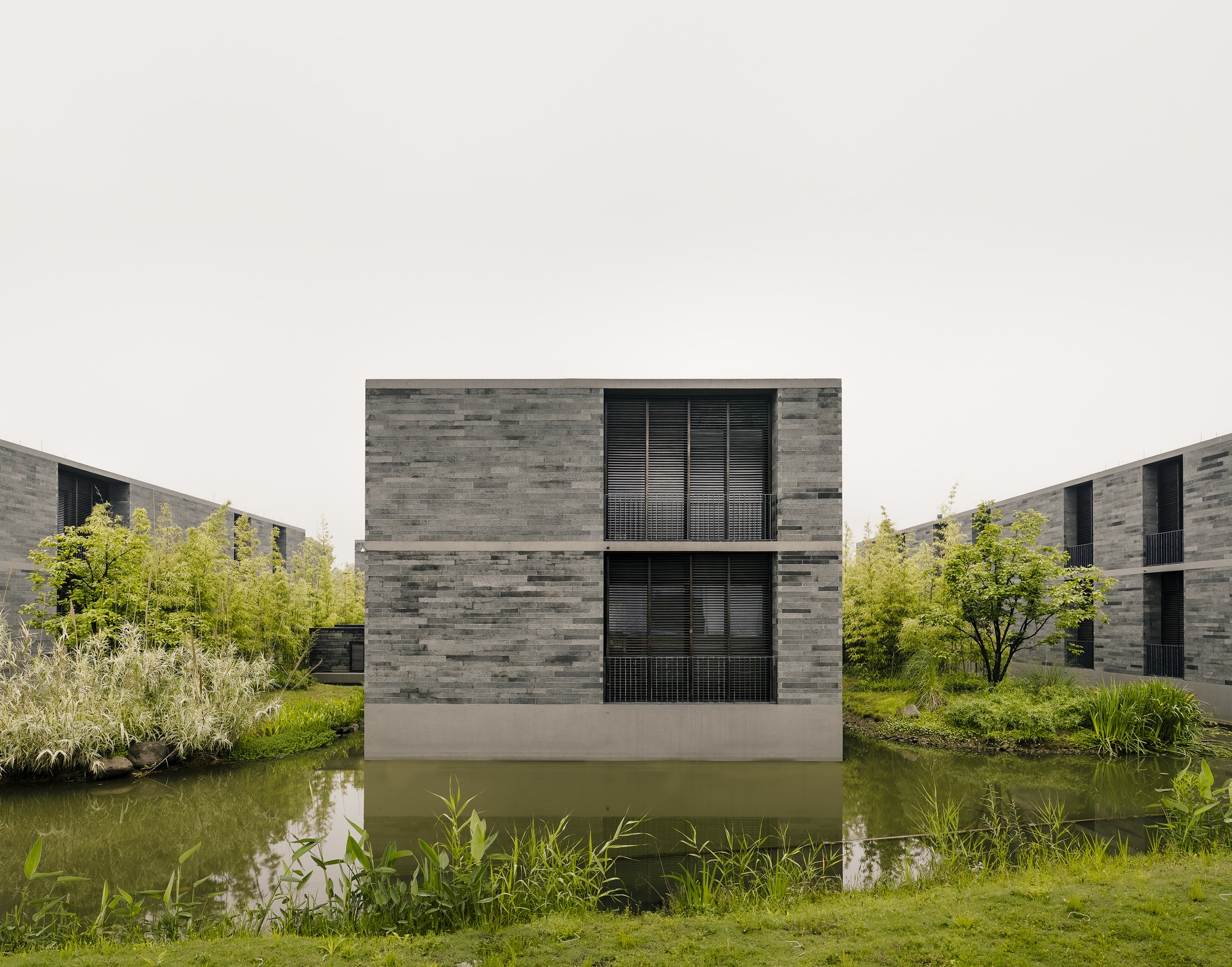 Chipperfield completes 'floating' wetland apartments
