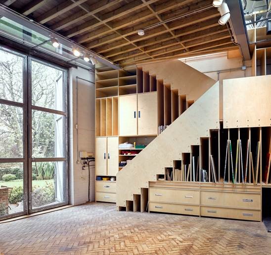 Stairs become storage in Syte Architects’ artist studio conversion