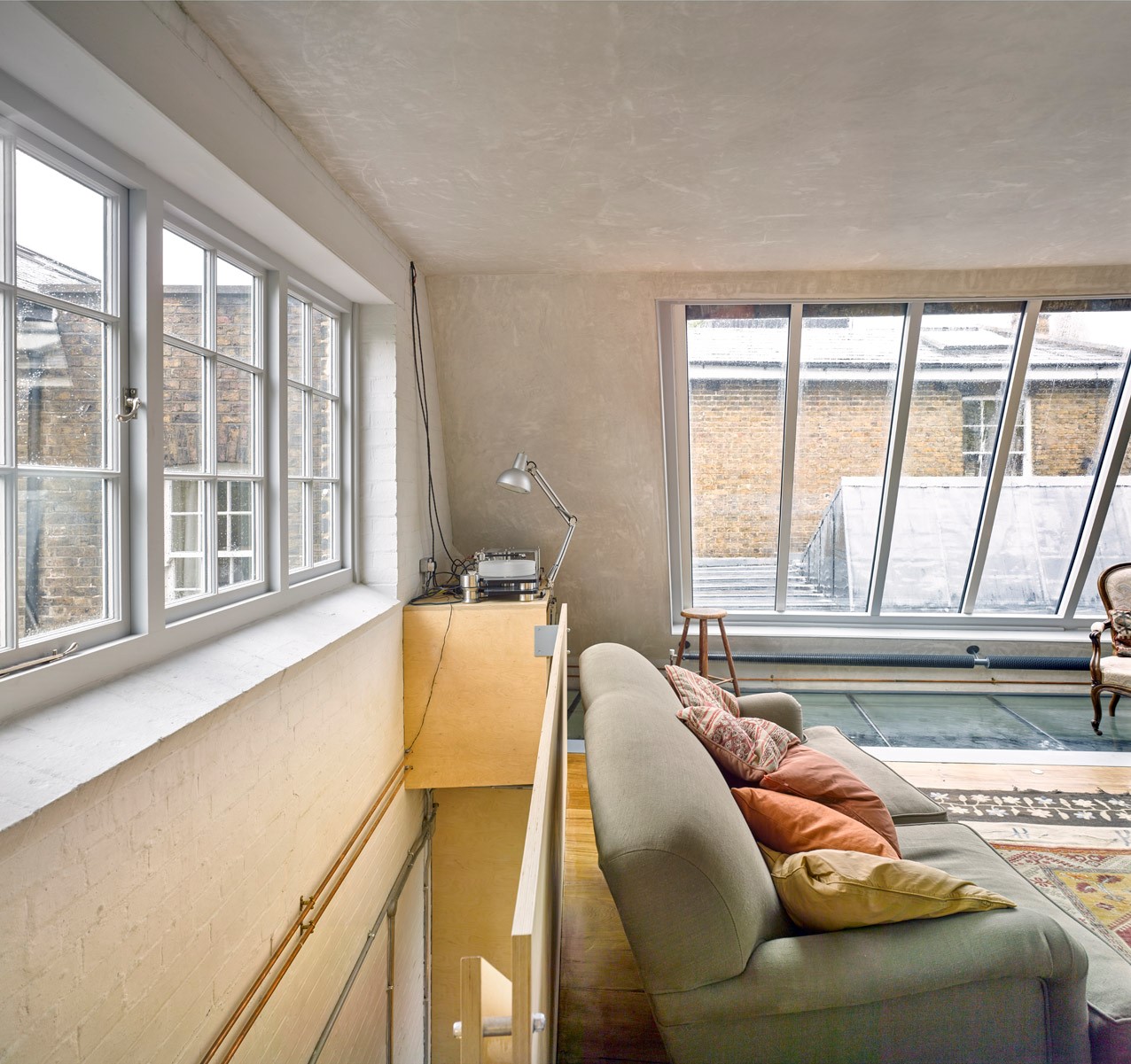 Stairs become storage in Syte Architects’ artist studio conversion