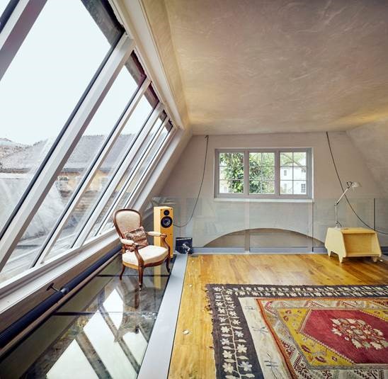 Stairs become storage in Syte Architects’ artist studio conversion