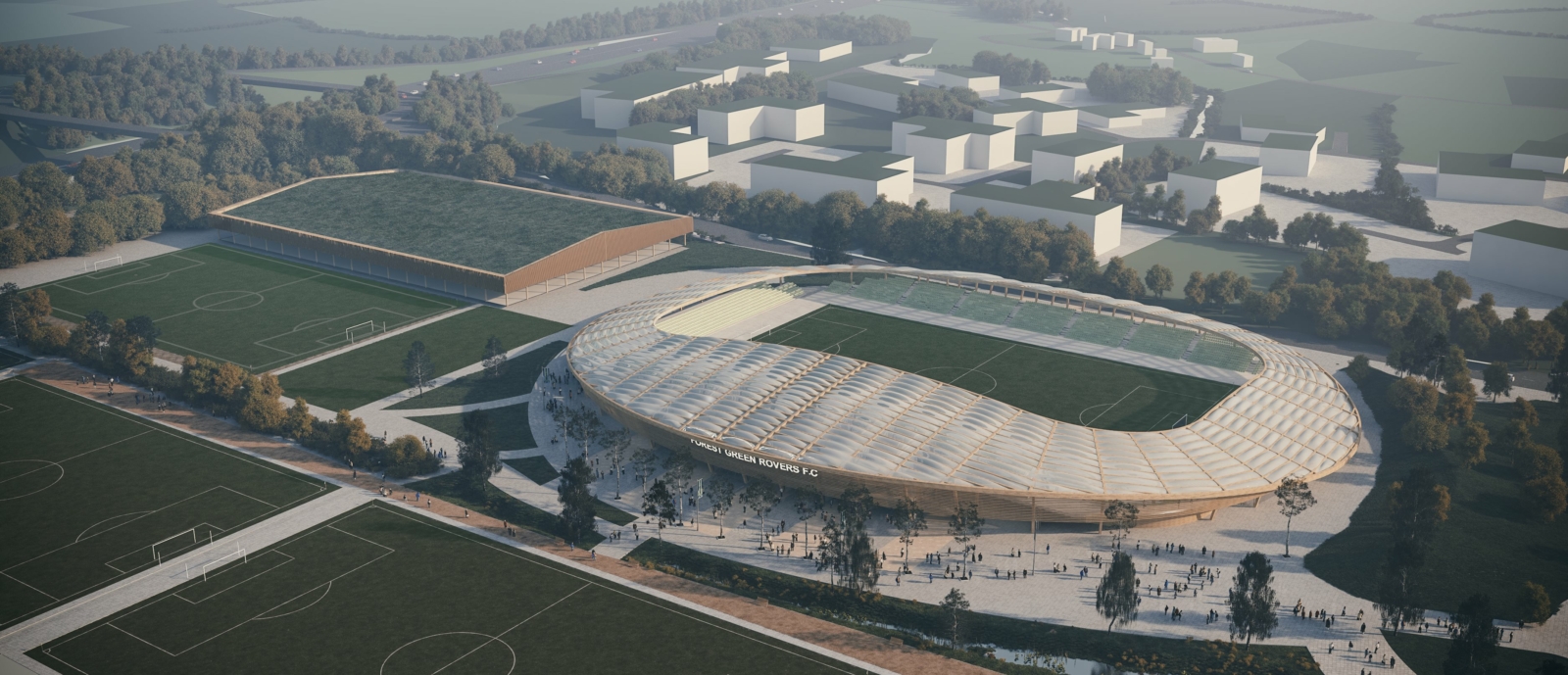 ZHA unveils tech hub and footbridge for Forest Green stadium eco park