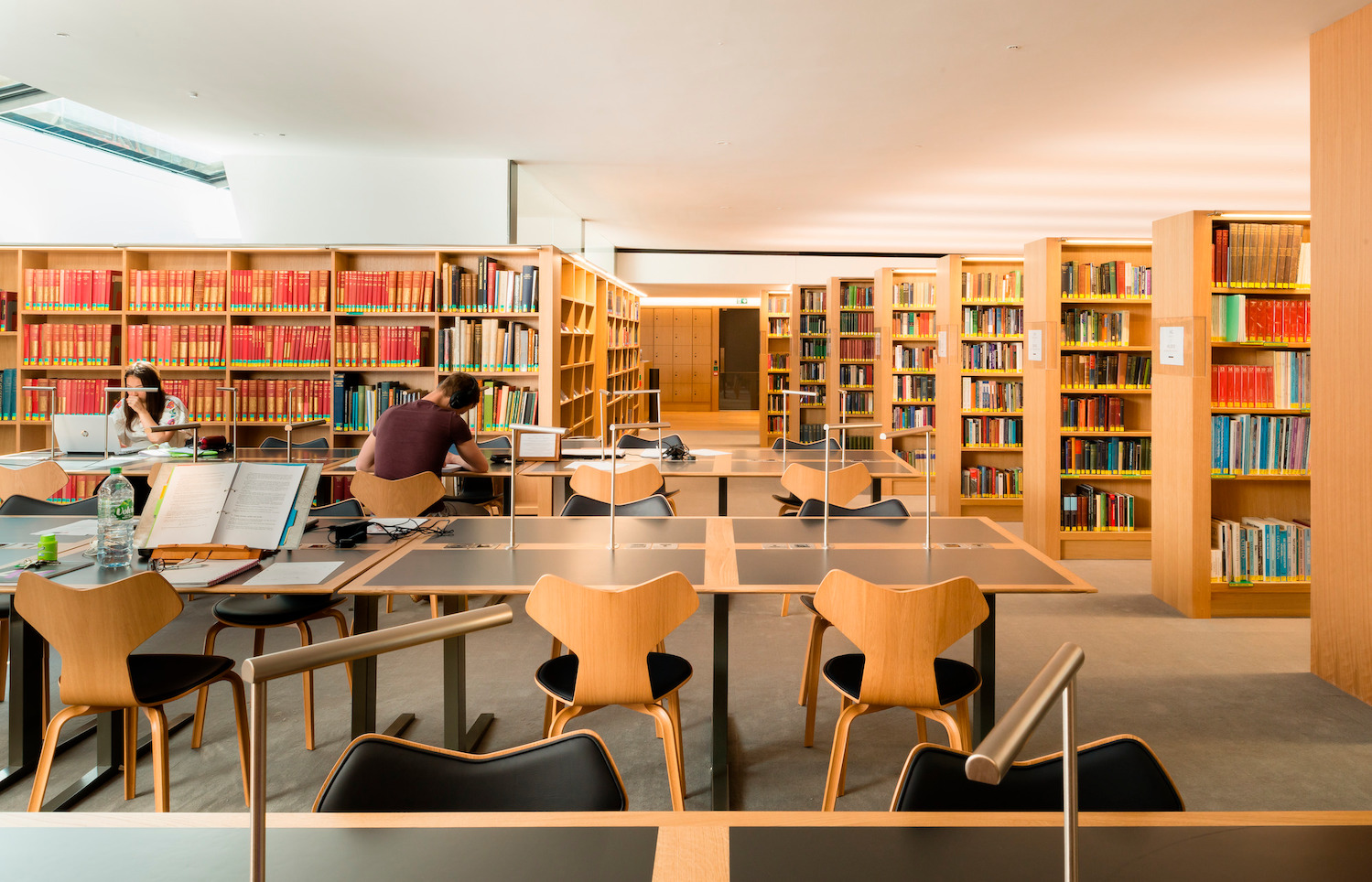 MICA Architects completes underground library at The Queen’s College ...