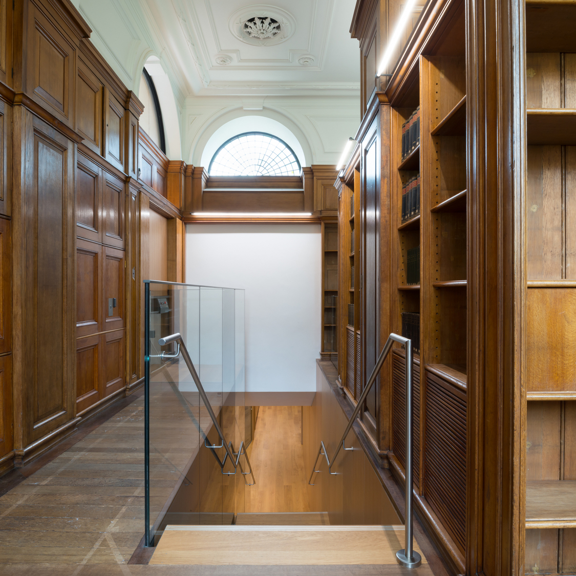 MICA Architects completes underground library at The Queen’s College ...