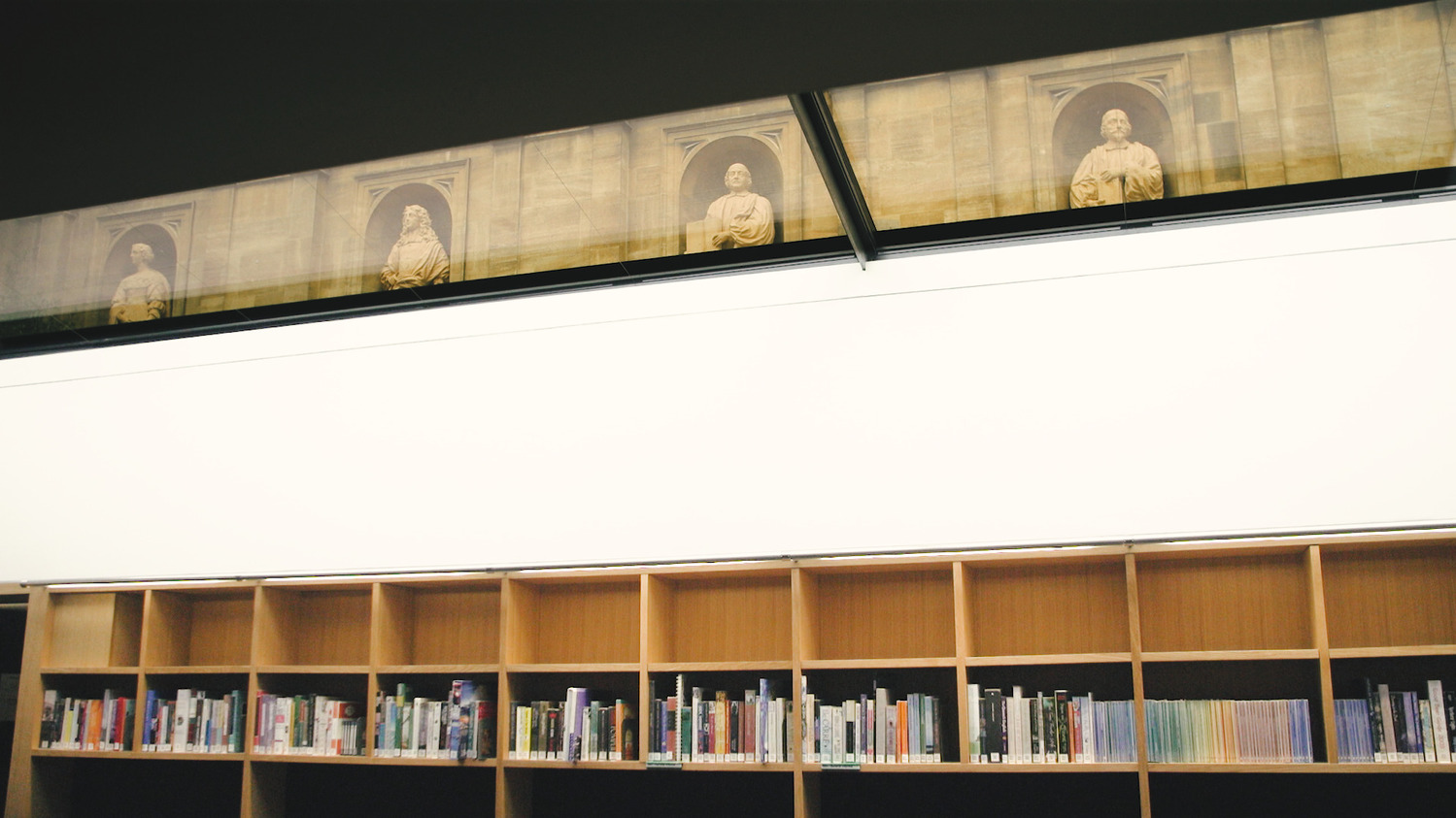 MICA Architects completes underground library at The Queen’s College ...