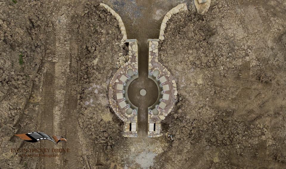 Assemble member designs Shropshire burial mound entrance