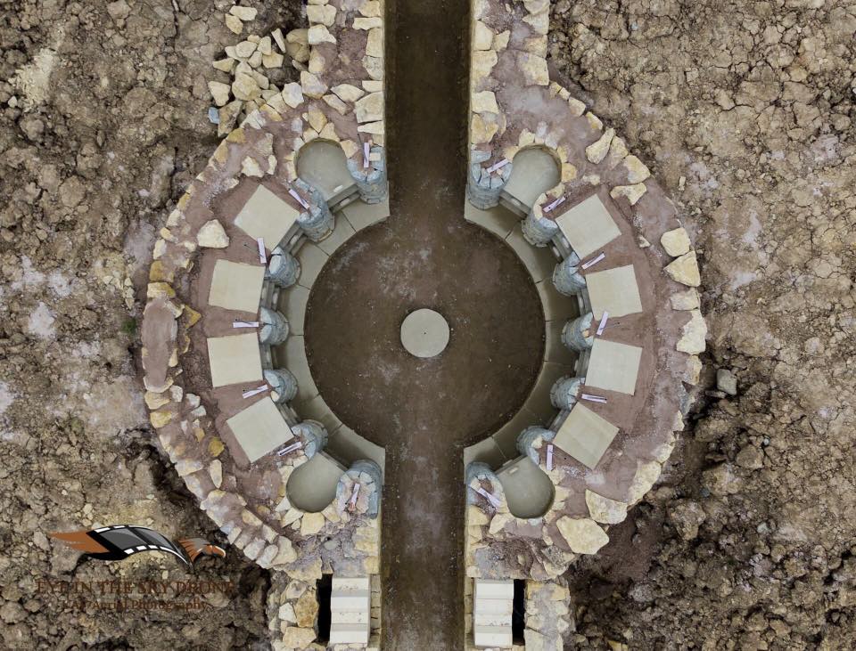 Assemble member designs Shropshire burial mound entrance