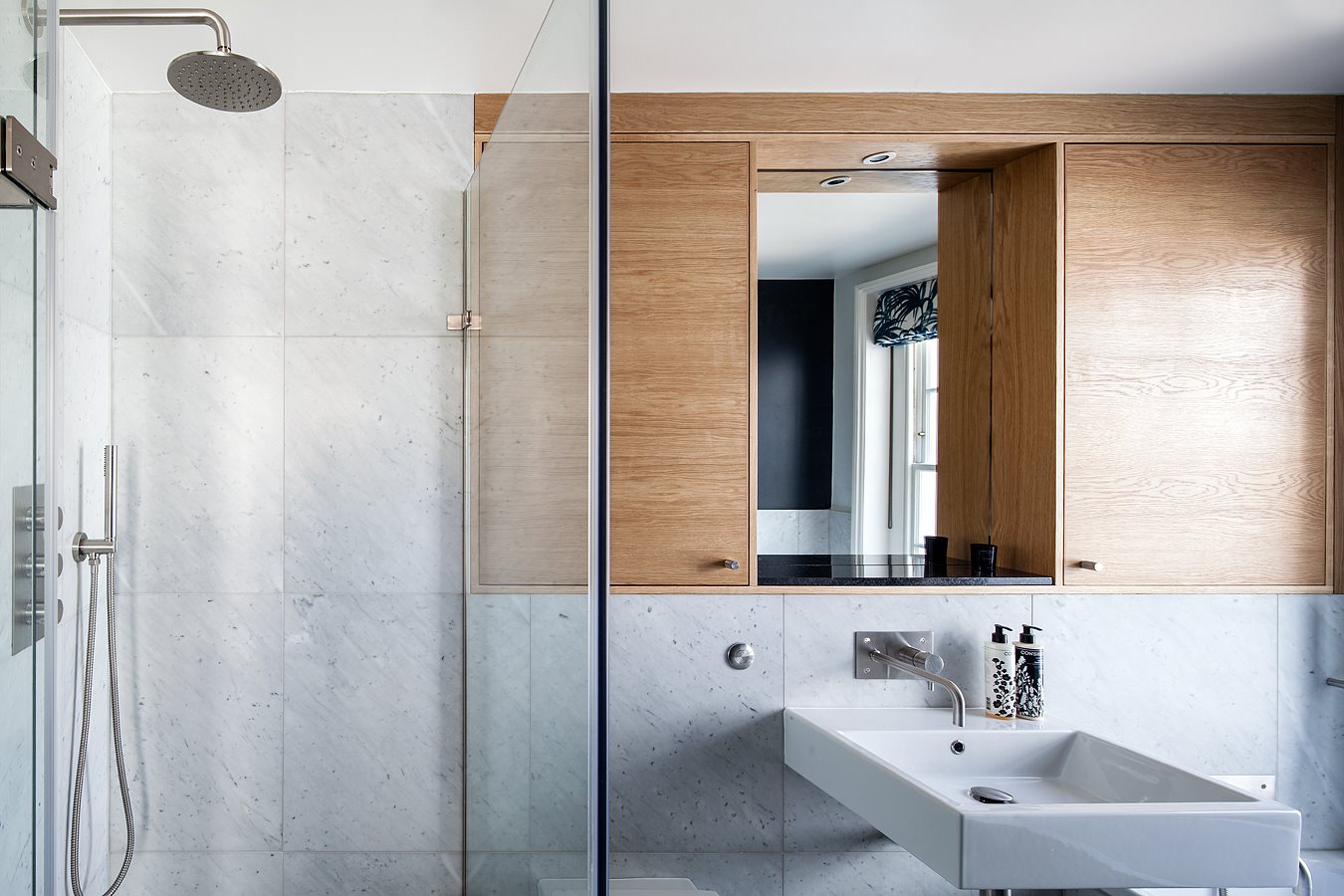 James Dunnett Architects extends London home with curved picture window