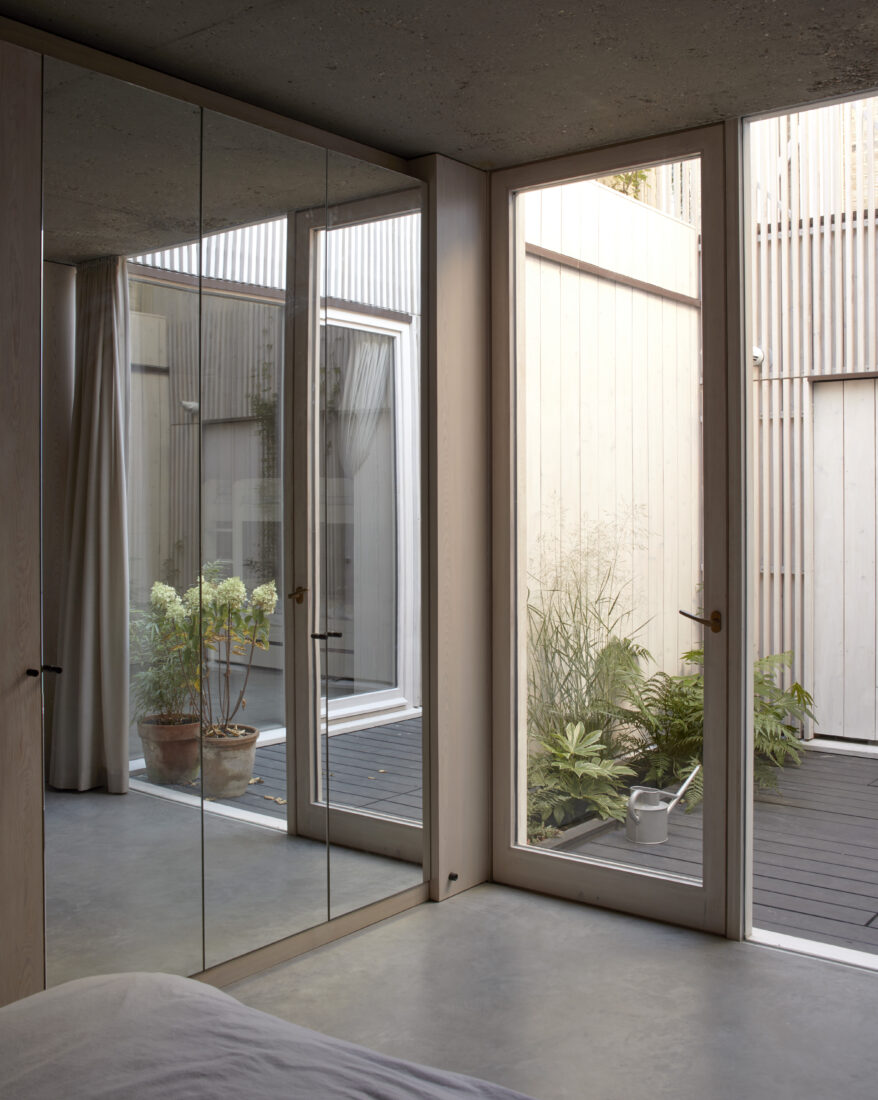 Garage site transformed into three-storey house by Tikari Works