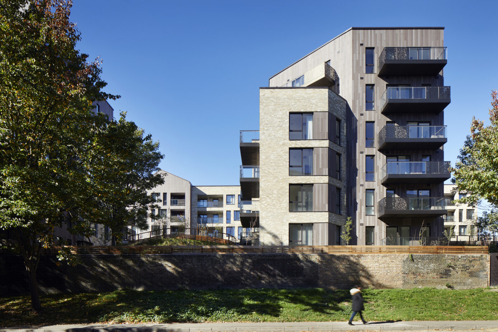 Jestico + Whiles completes lightweight steel-frame housing above ...