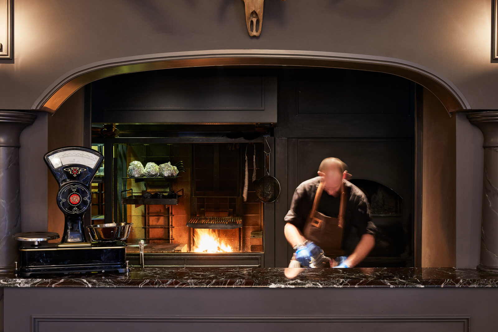 Moxon transforms Highland hotel with ‘primitive’ tree trunk column ...