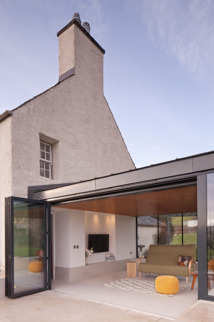 TAP Architects completes ‘glass-room’ extension to historic house