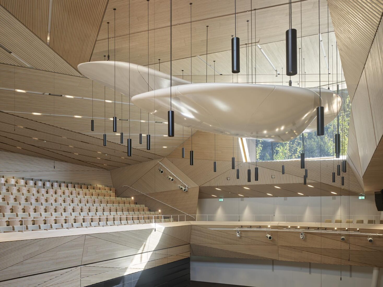Alpine ski village concert hall completed by Studio Seilern in Switzerland