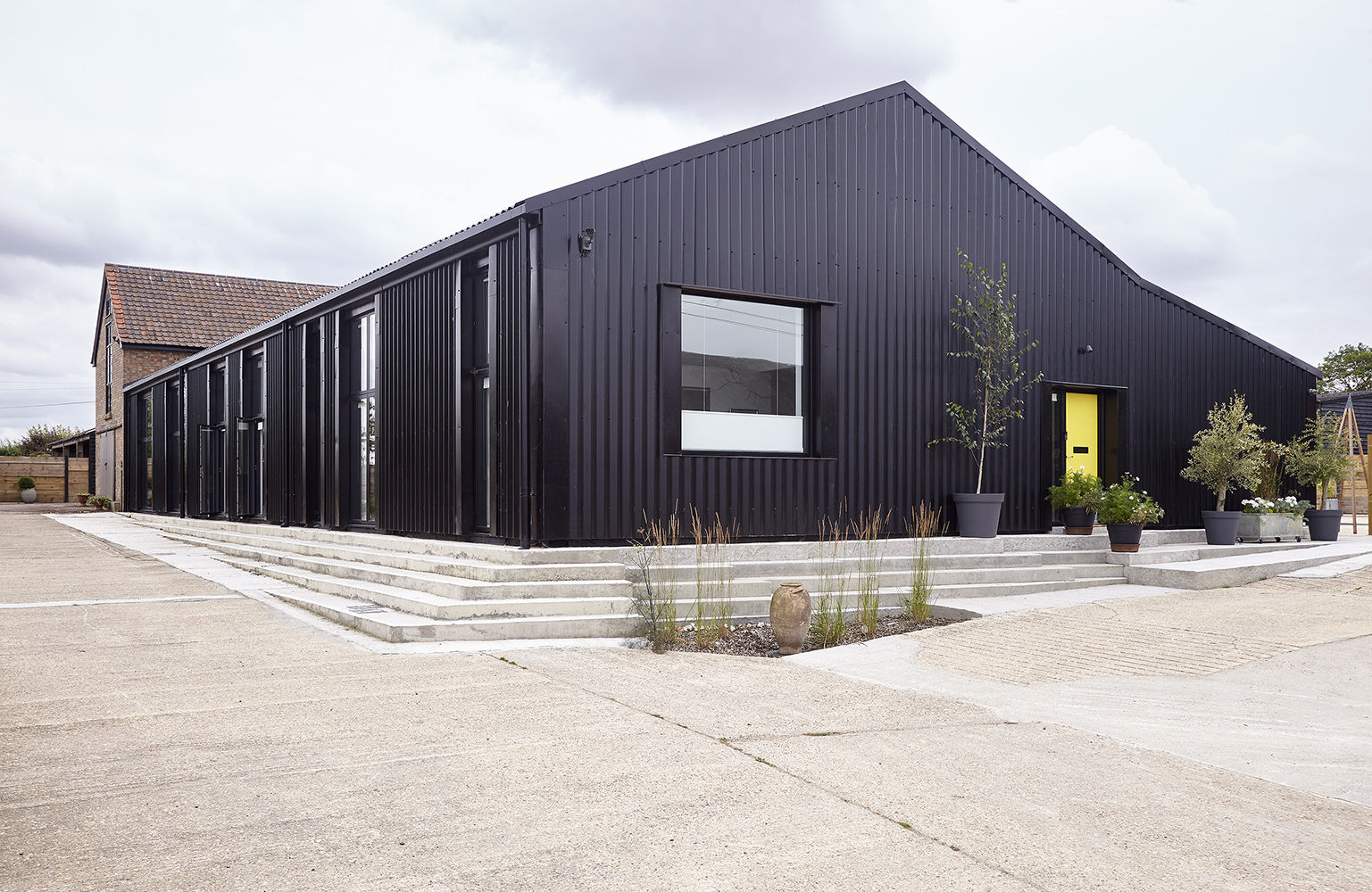 Self-build Project Orange-designed house replaces redundant barn in Suffolk