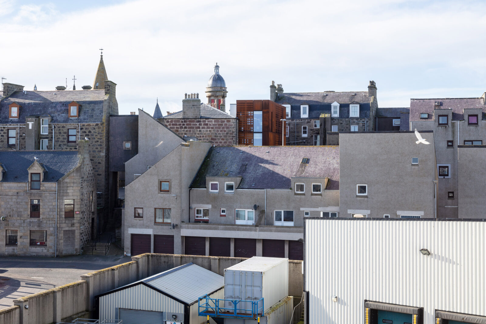 Moxon Architects rework Fraserburgh's civic hub with weathered steel ...