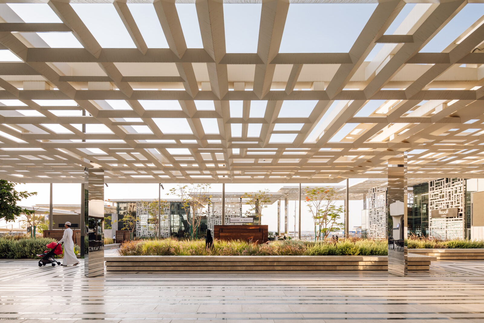 ACME creates stone-fretted waterside square in Muscat