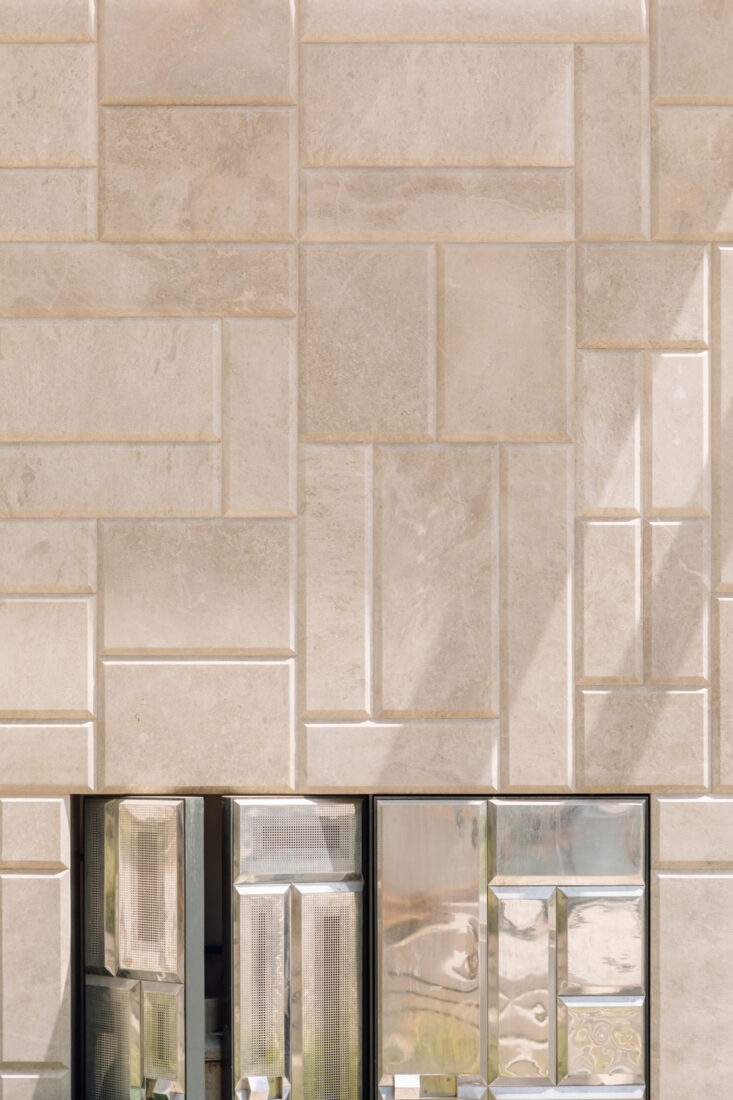 ACME creates stone-fretted waterside square in Muscat