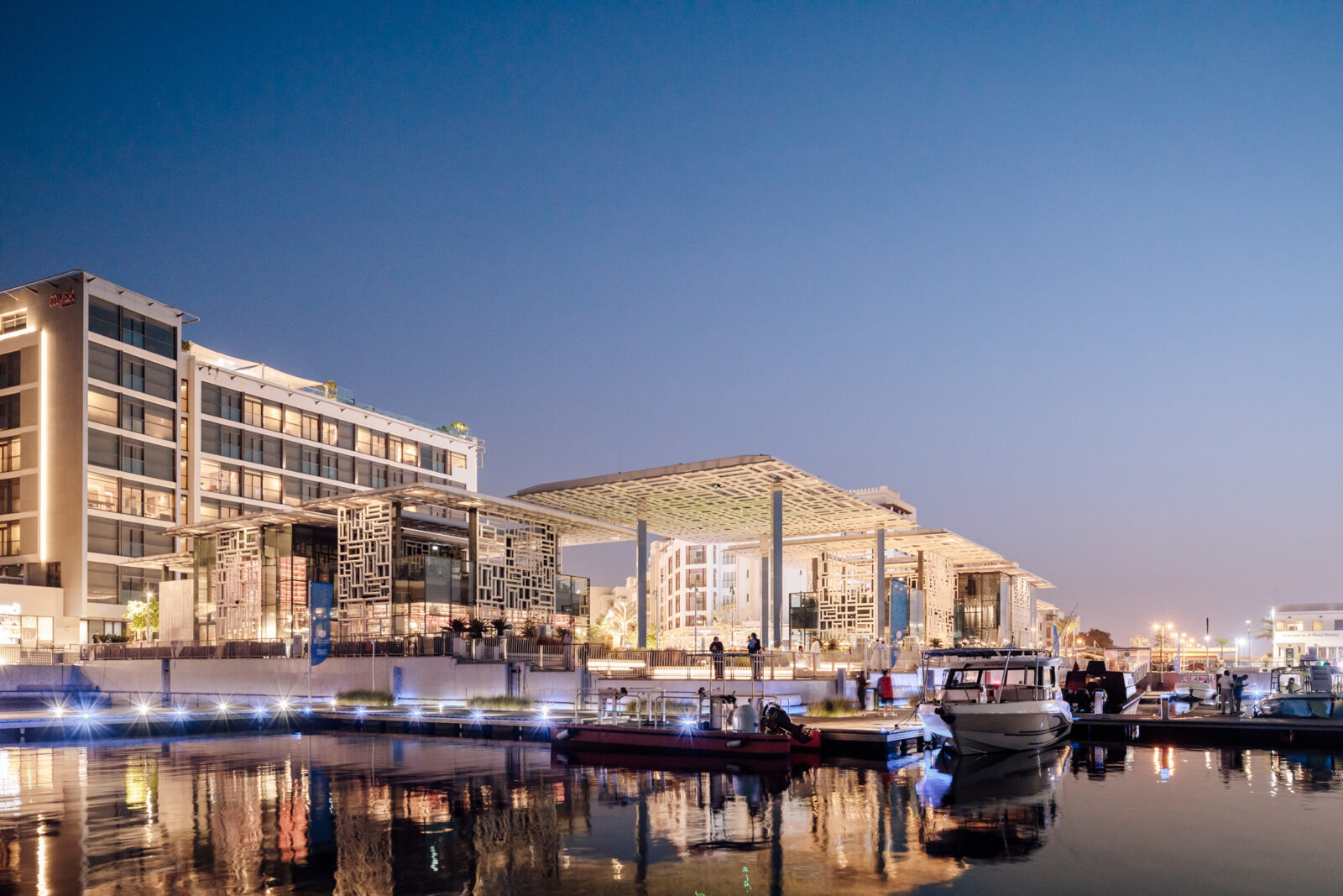 ACME creates stone-fretted waterside square in Muscat