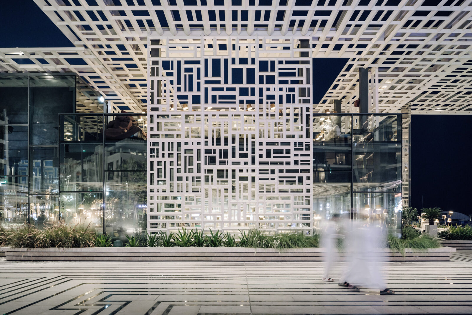 ACME creates stone-fretted waterside square in Muscat