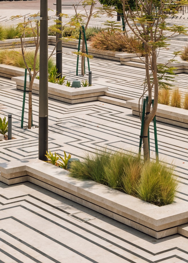 ACME creates stone-fretted waterside square in Muscat