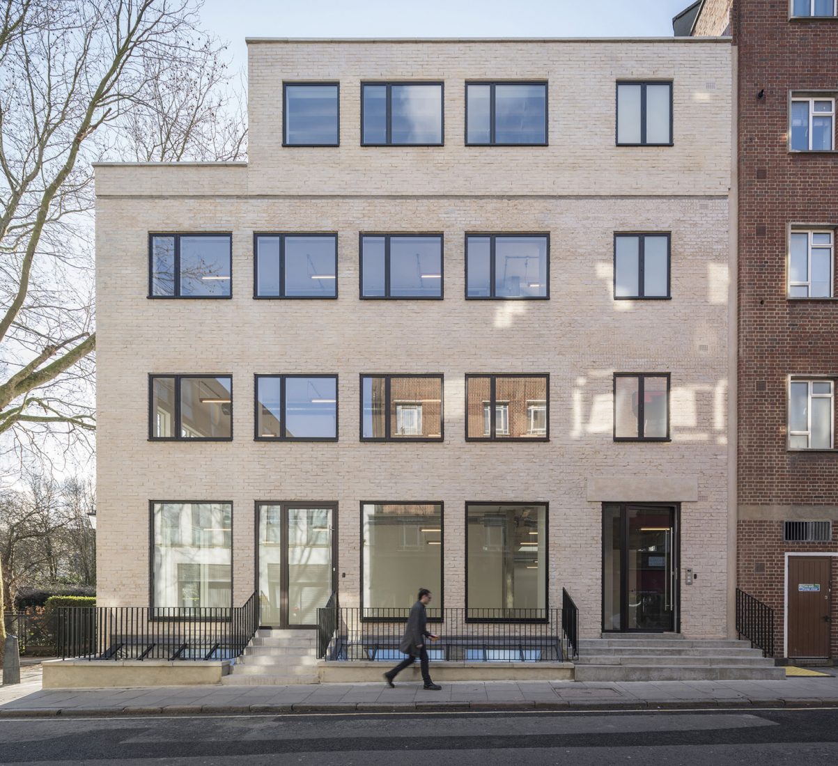 Stagg Architects opens up ‘introverted’ office building in detail-led ...