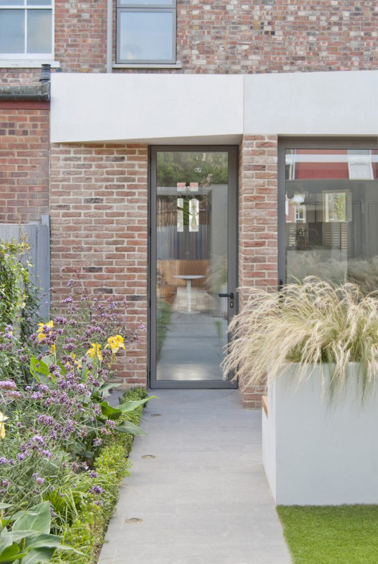 Novak Hiles reworks house with sculptural chamfered extension