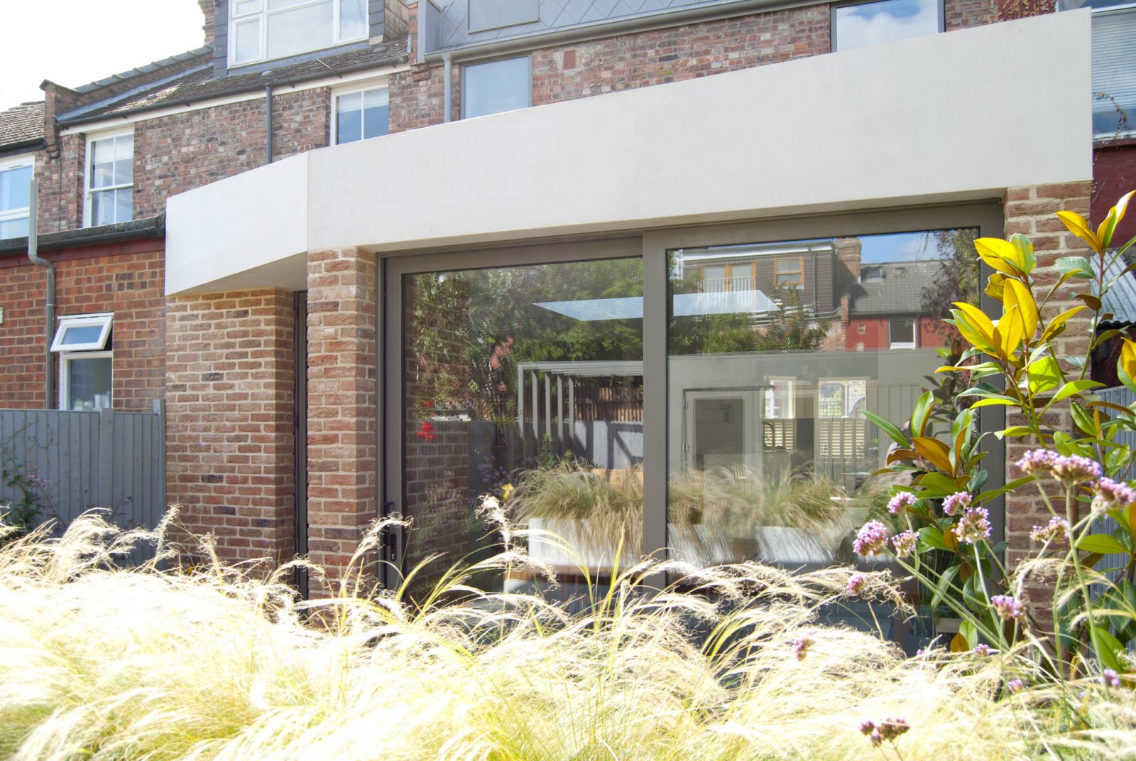 Novak Hiles reworks house with sculptural chamfered extension
