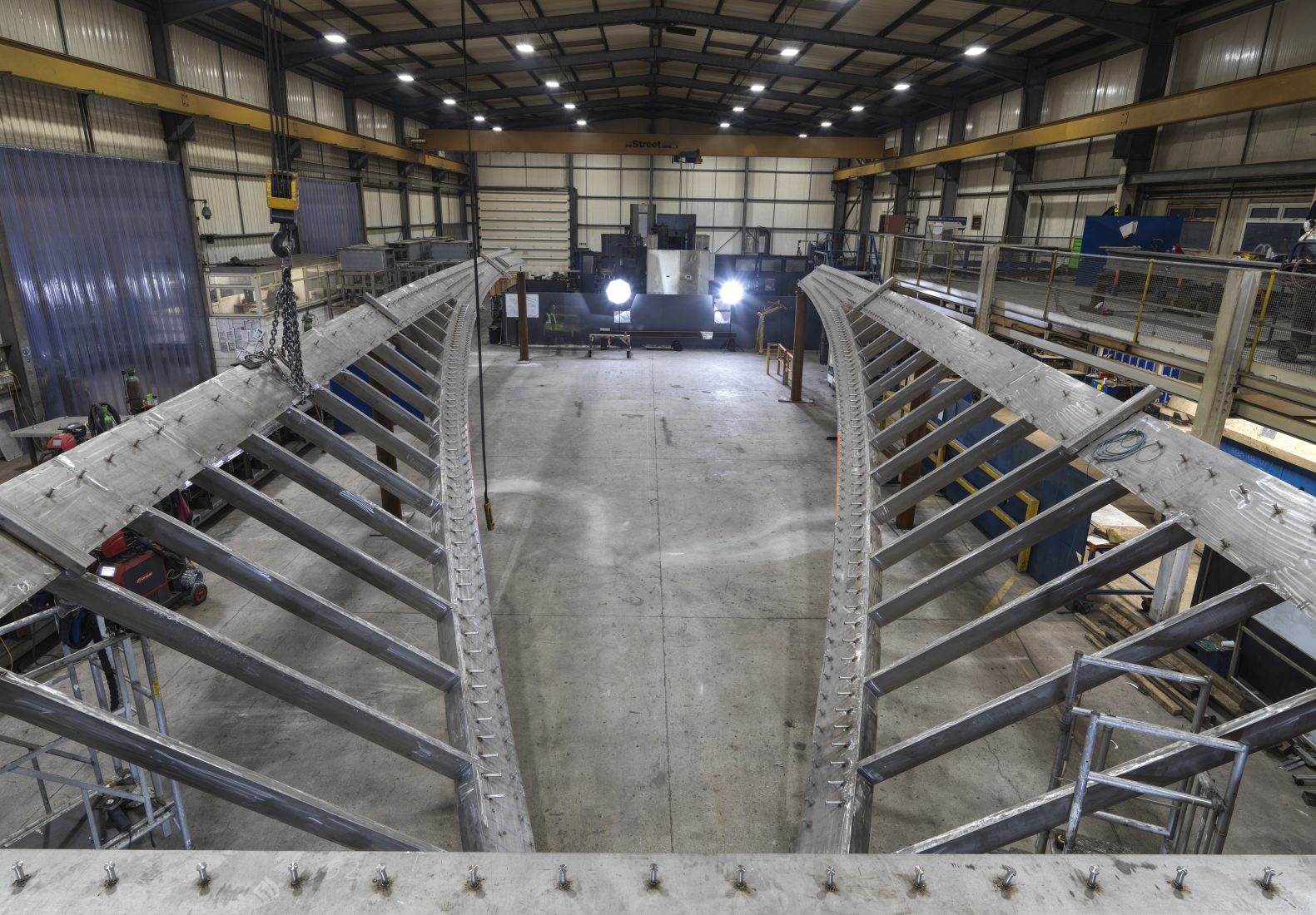 Knight Architects’ stainless-steel bridge opens in Lake District