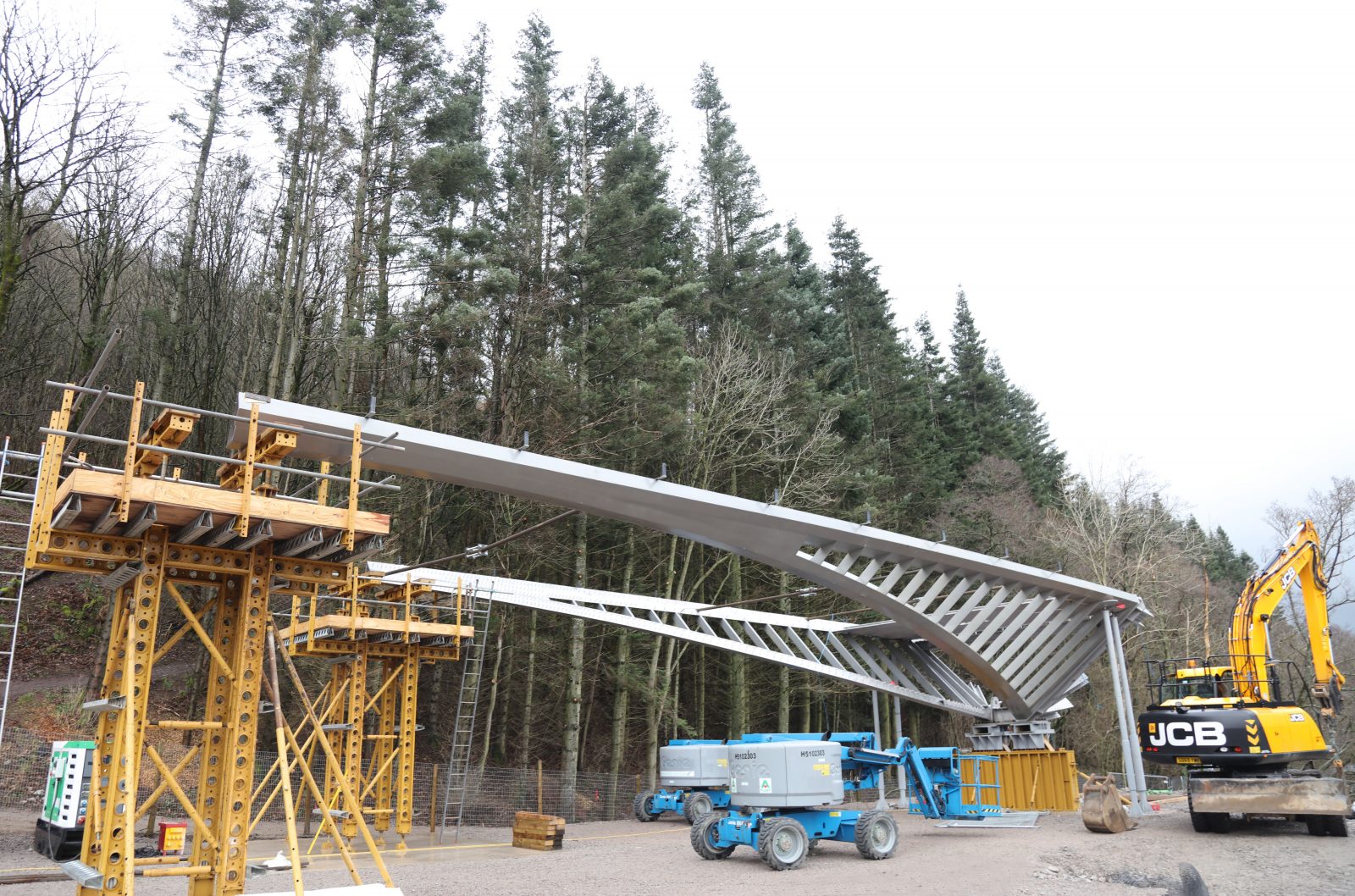 Knight Architects’ stainless-steel bridge opens in Lake District