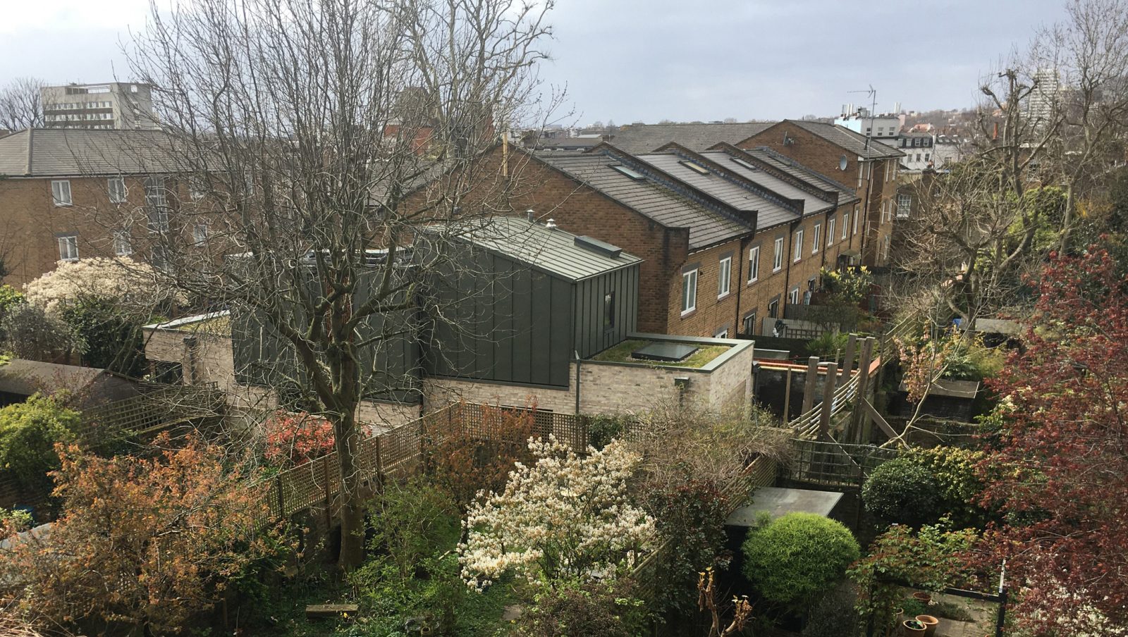 Alan Morris Architects completes ‘Hidden House’ in north London garden