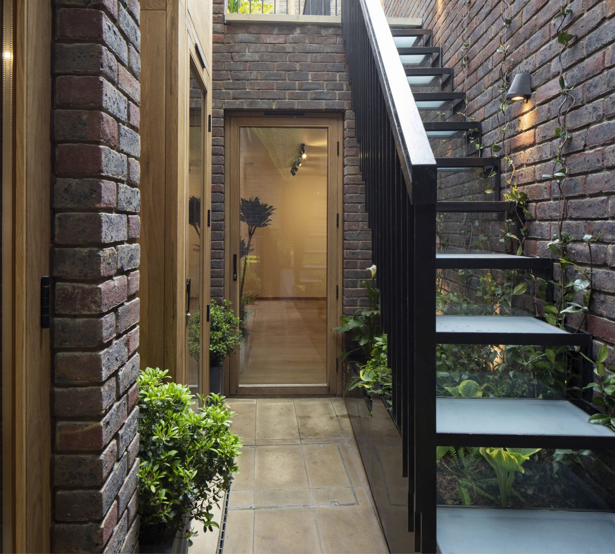 Satish Jassal completes brick winged house in Southwark