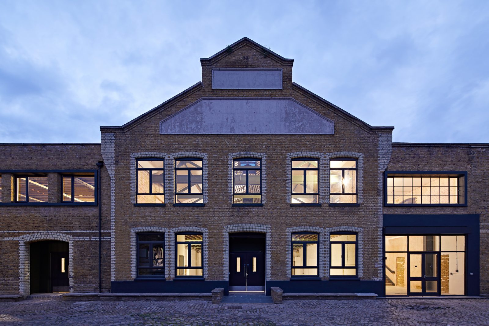Studio RHE completes retrofit of former bottling factory for Fabrix