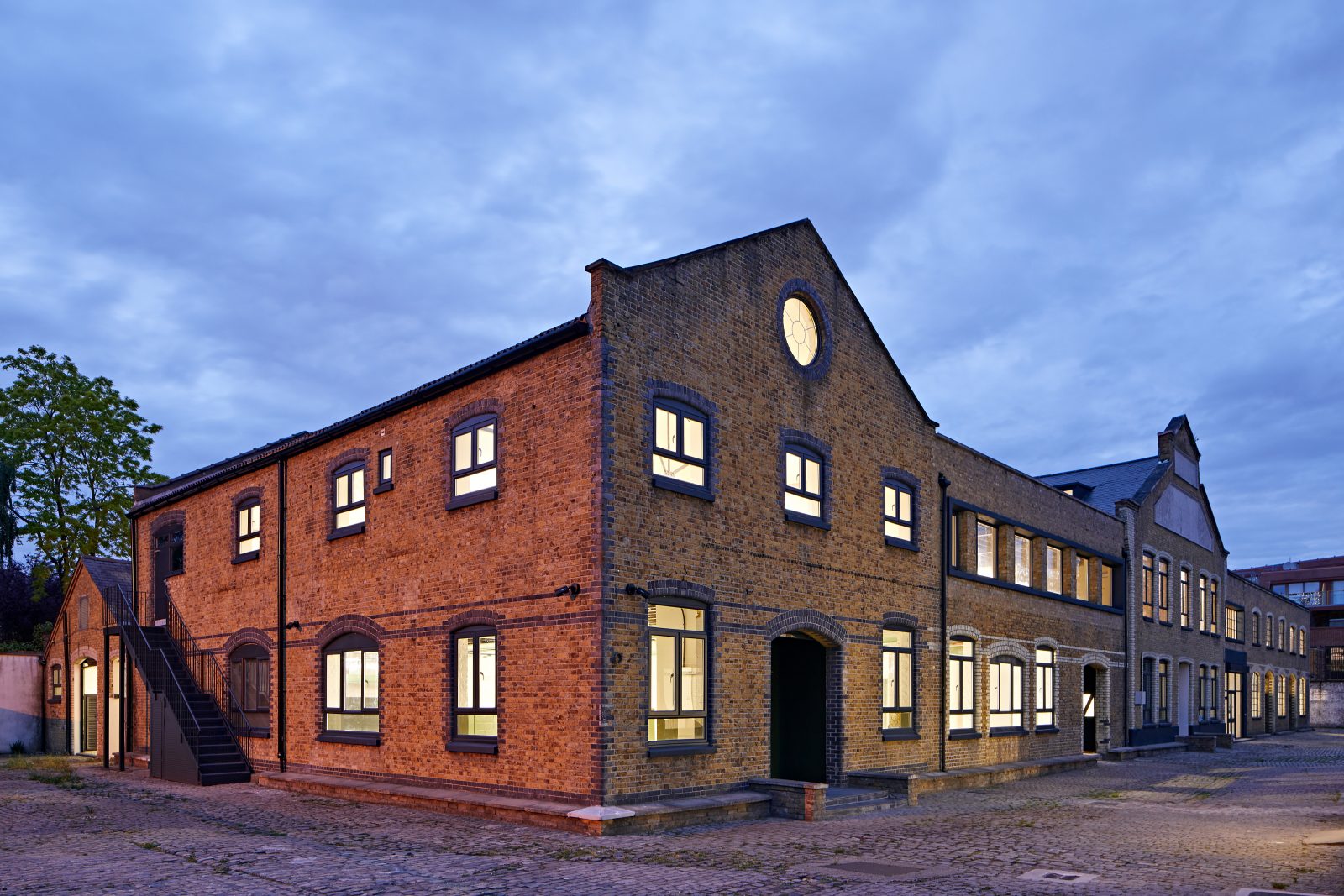 Studio RHE completes retrofit of former bottling factory for Fabrix