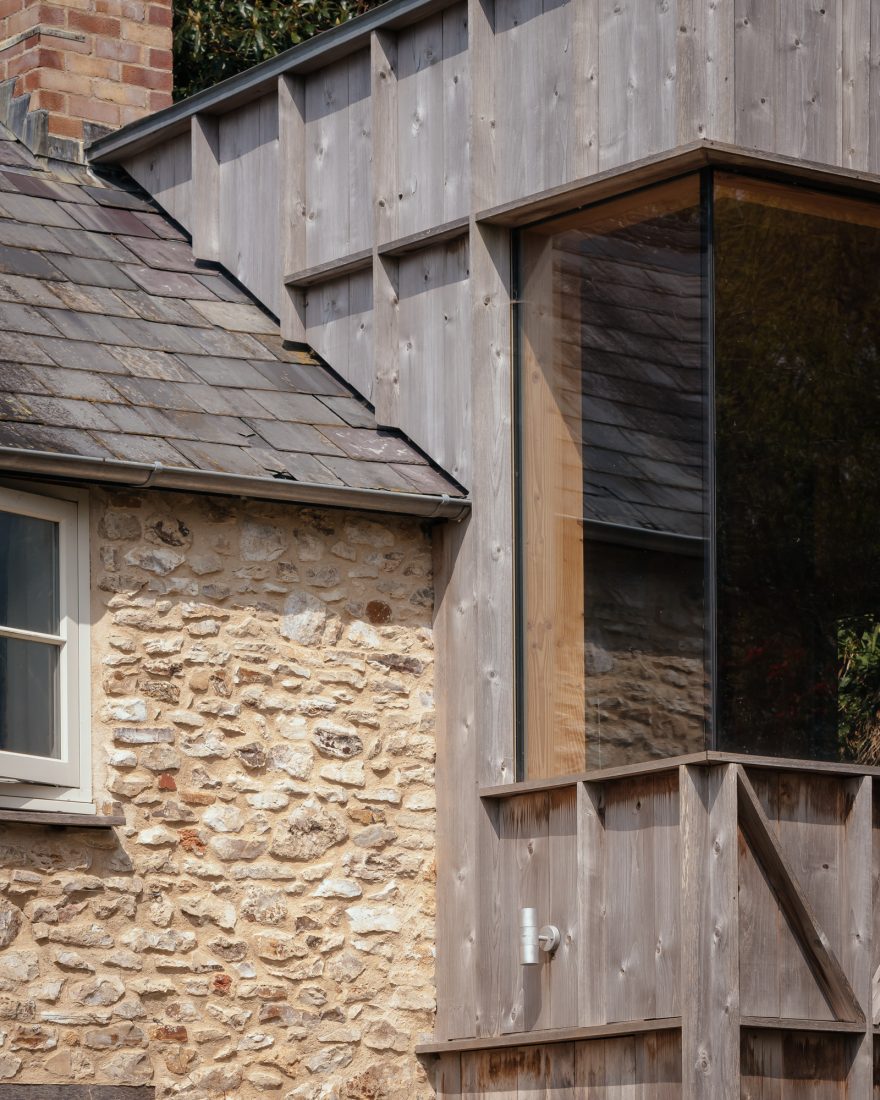 Studio Weave adds timber retreat to stone cottage in Devon
