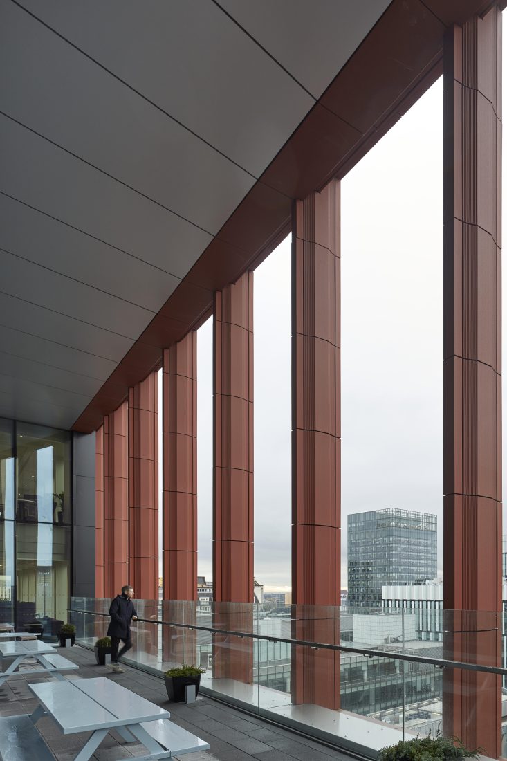 Glenn Howells completes terracotta-clad office block in Manchester